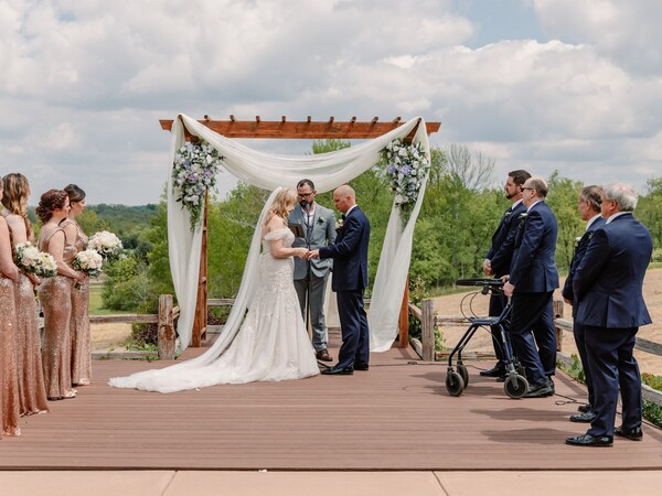 Pastor Sutter Photos - The Knot